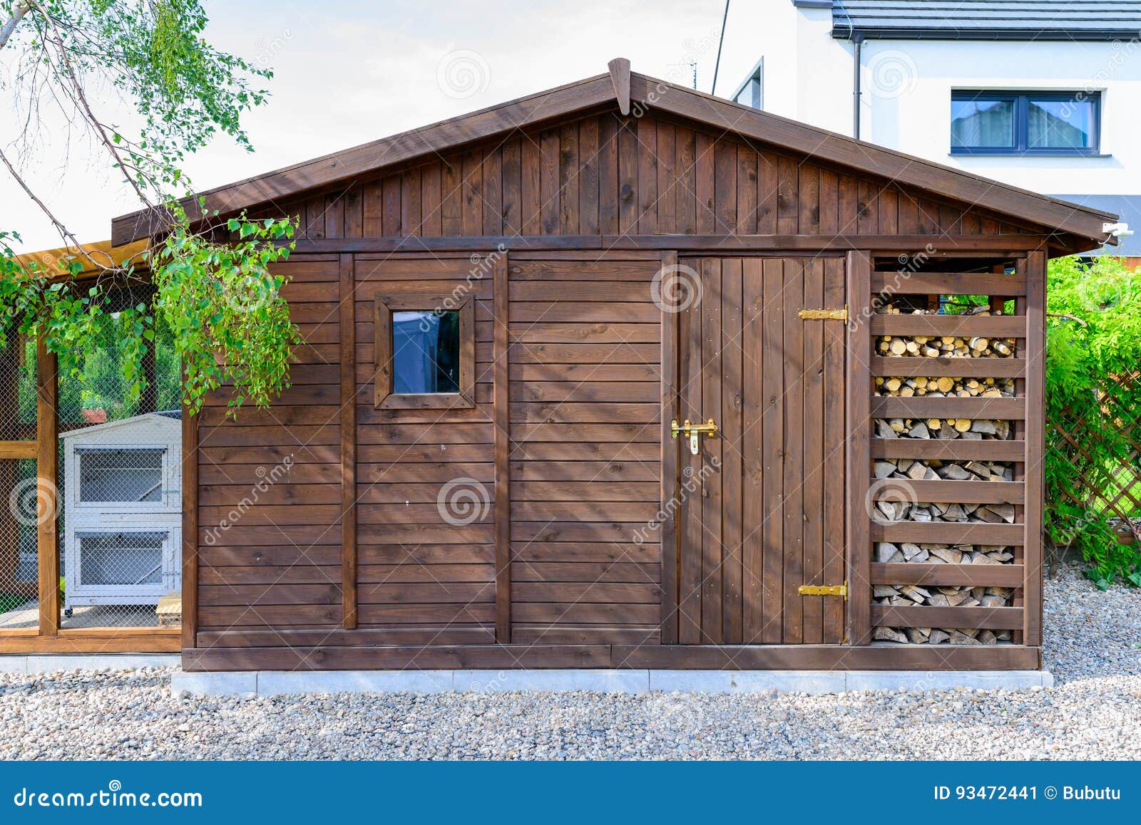 Garden Shed Exterior in Spring, with Woodshed Stock Image - Image of ...