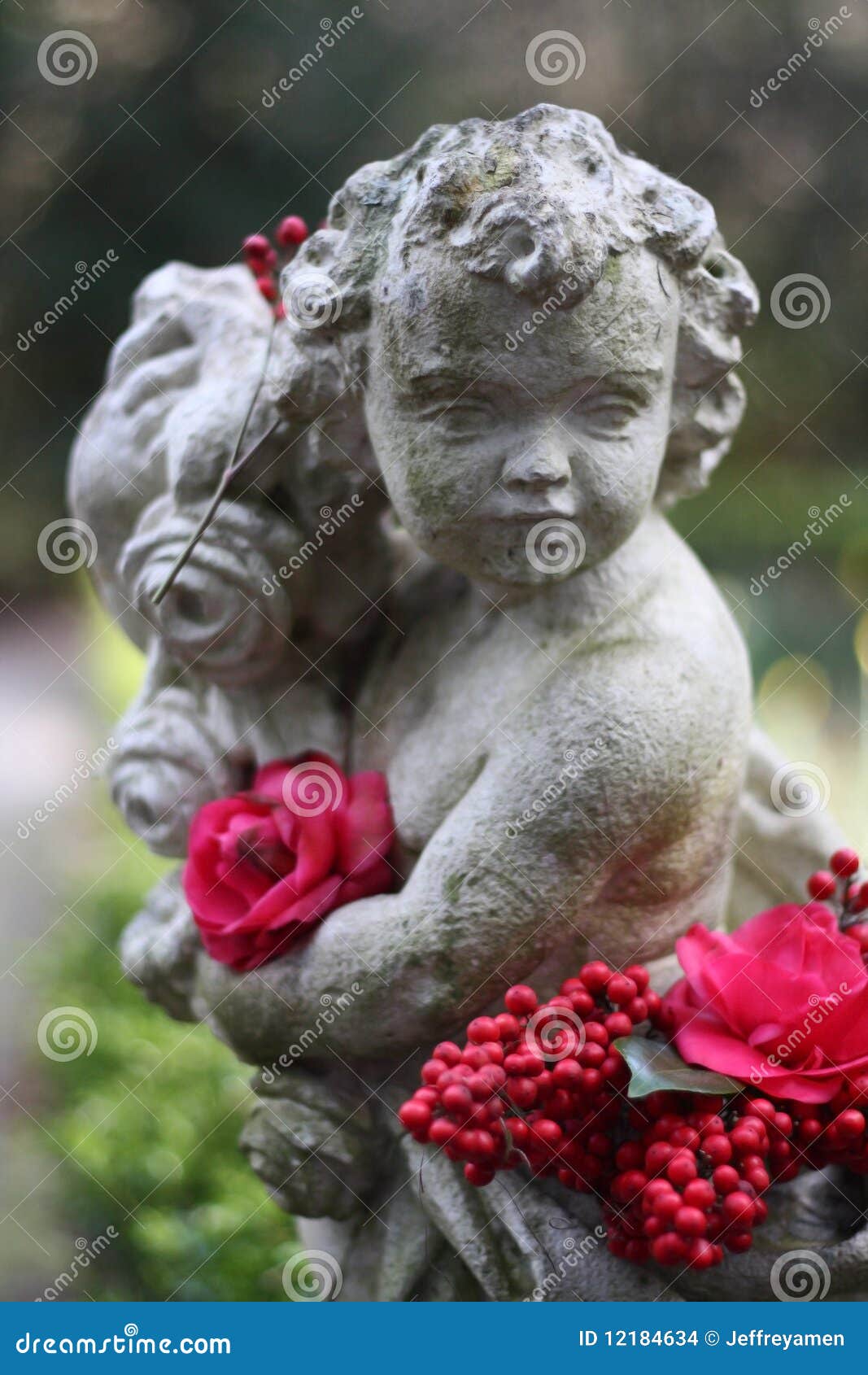 Garden Statue with Colorful Flowers Stock Photo - Image of decorative ...