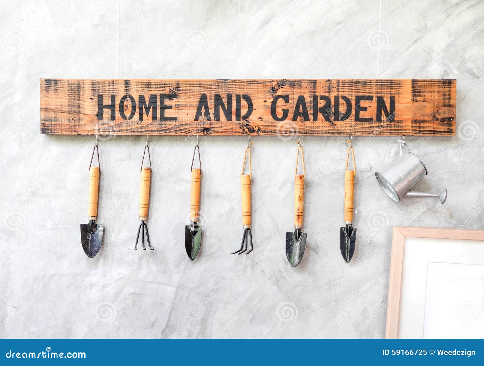Garden Tool Hanging on Concrete Wall with Wooden Label Stock Image ...