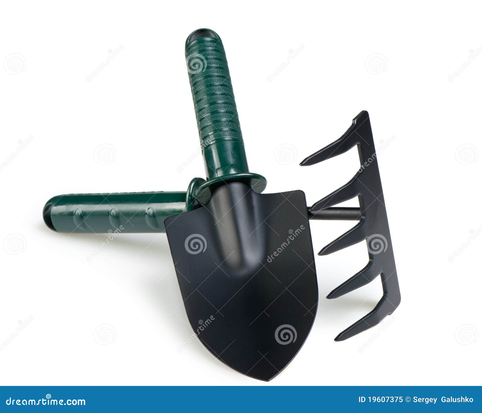 Shovel, Rake And Flowerpot On The Background Of A White Brick Wall ...