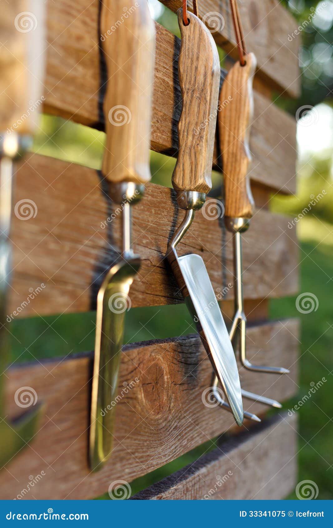 Garden Tools on Board Fence Stock Image - Image of pale, tool: 33341075
