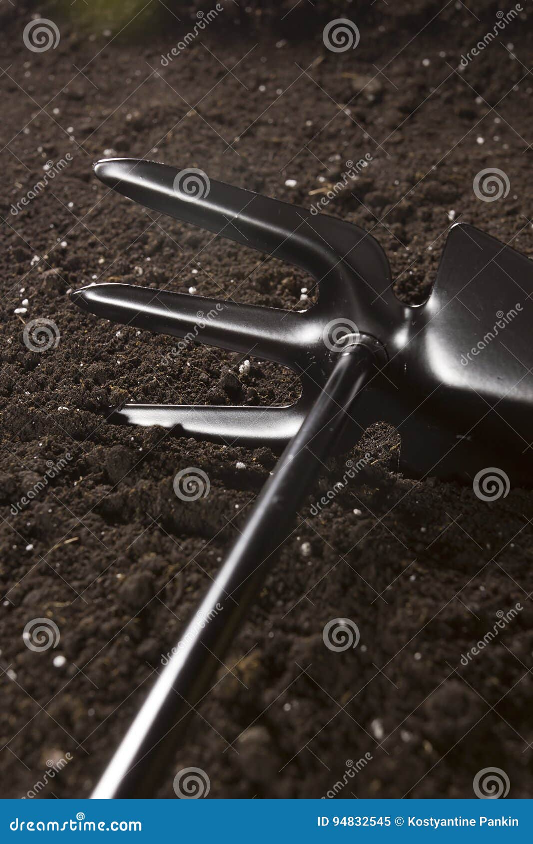Garden tools in the ground stock image. Image of equipment - 94832545
