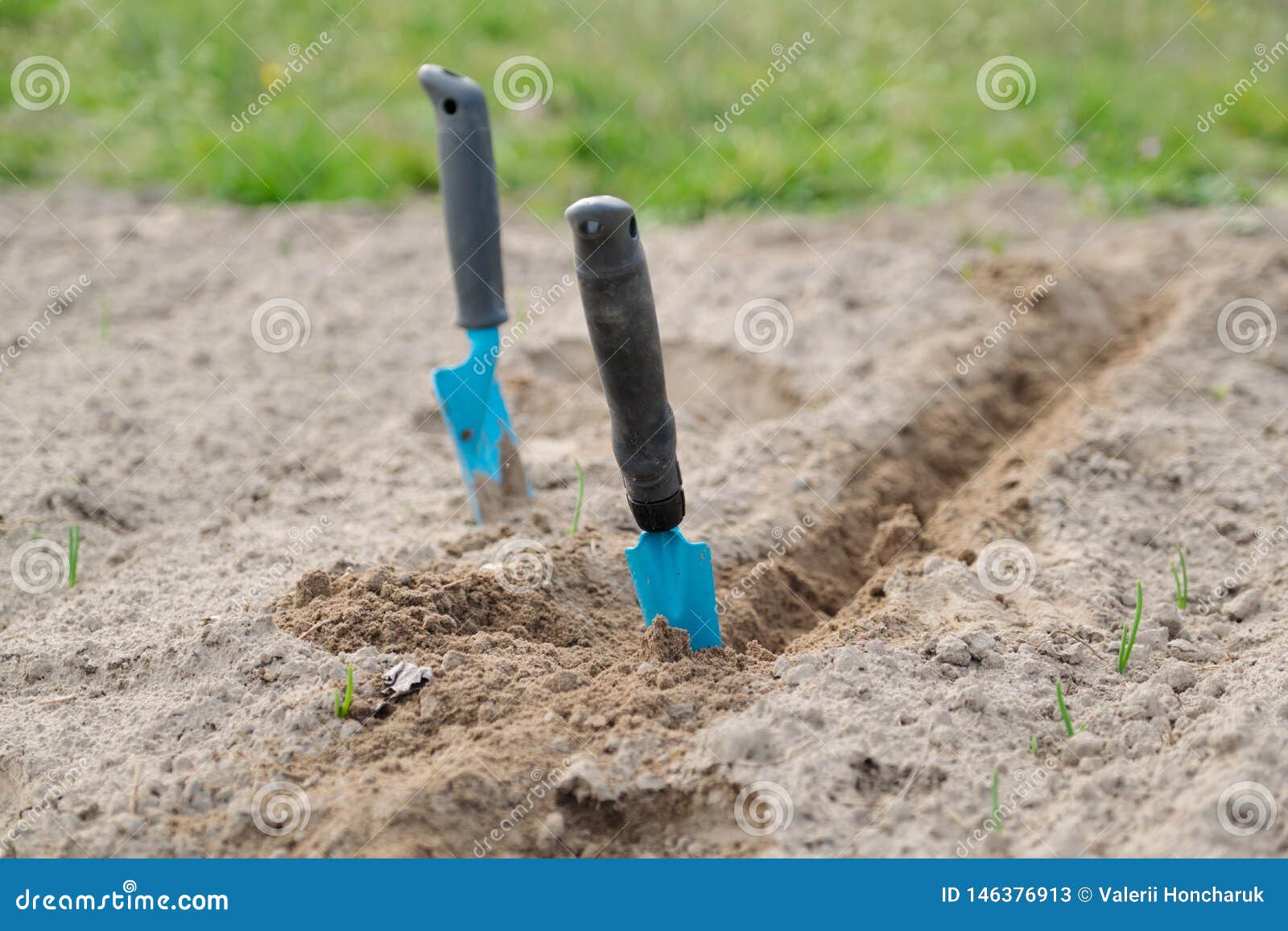 Garden Tools in the Soil, Spring Work on the Ground Stock Image - Image ...