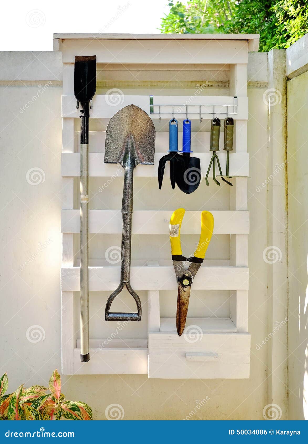 Garden tools wall stock photo. Image of sprinkling, waterpot - 50034086