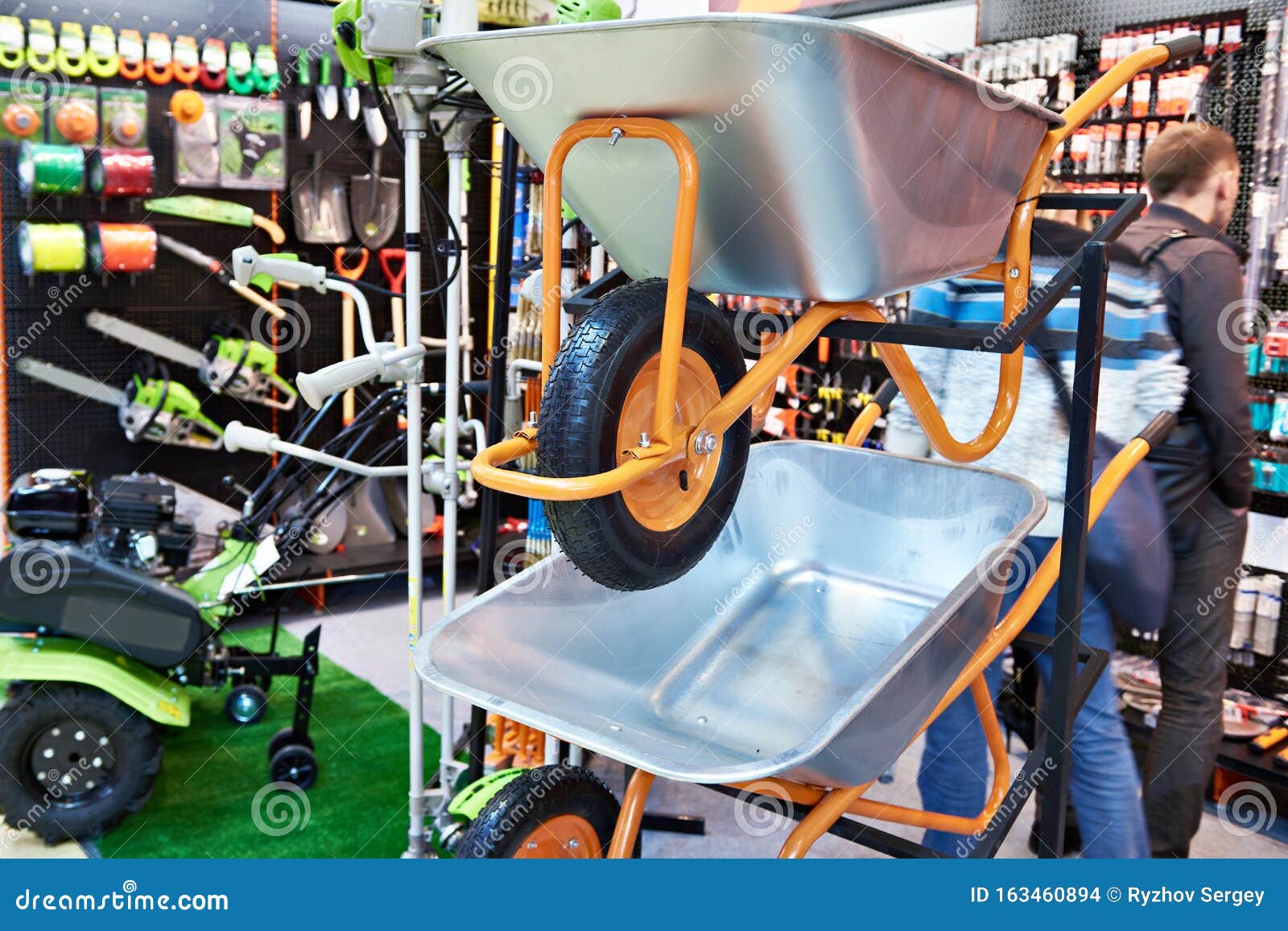 Garden Wheelbarrows and Tools in Store Editorial Stock Image - Image of ...