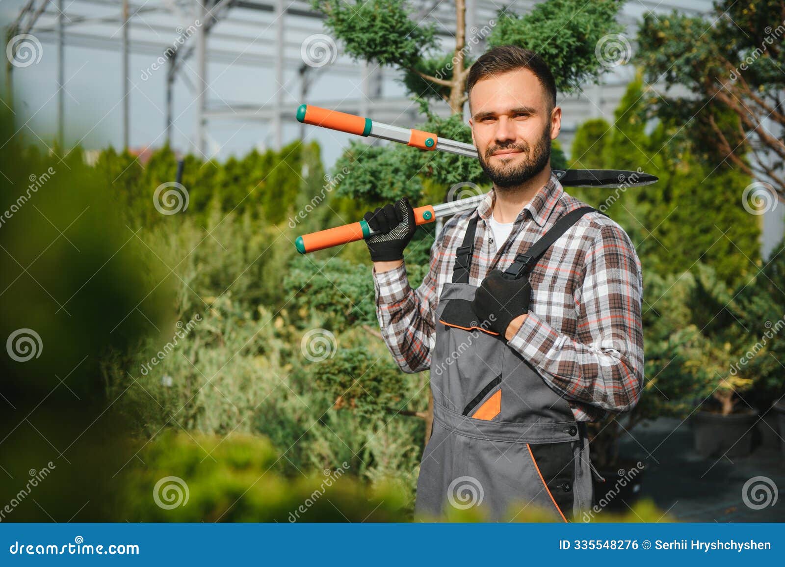 Garden Worker Trimming Trees with Scissors. Garden Shop Stock Photo ...