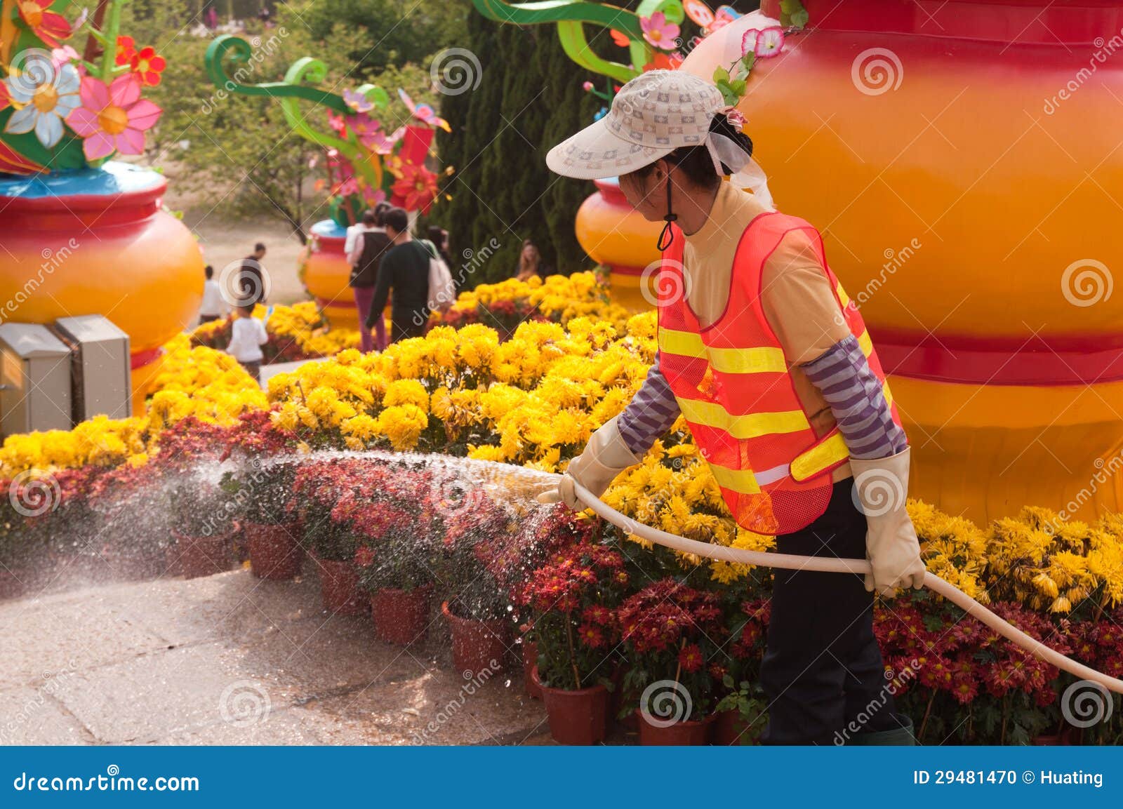 Garden Worker in the Watering the Flowers Editorial Image - Image of ...