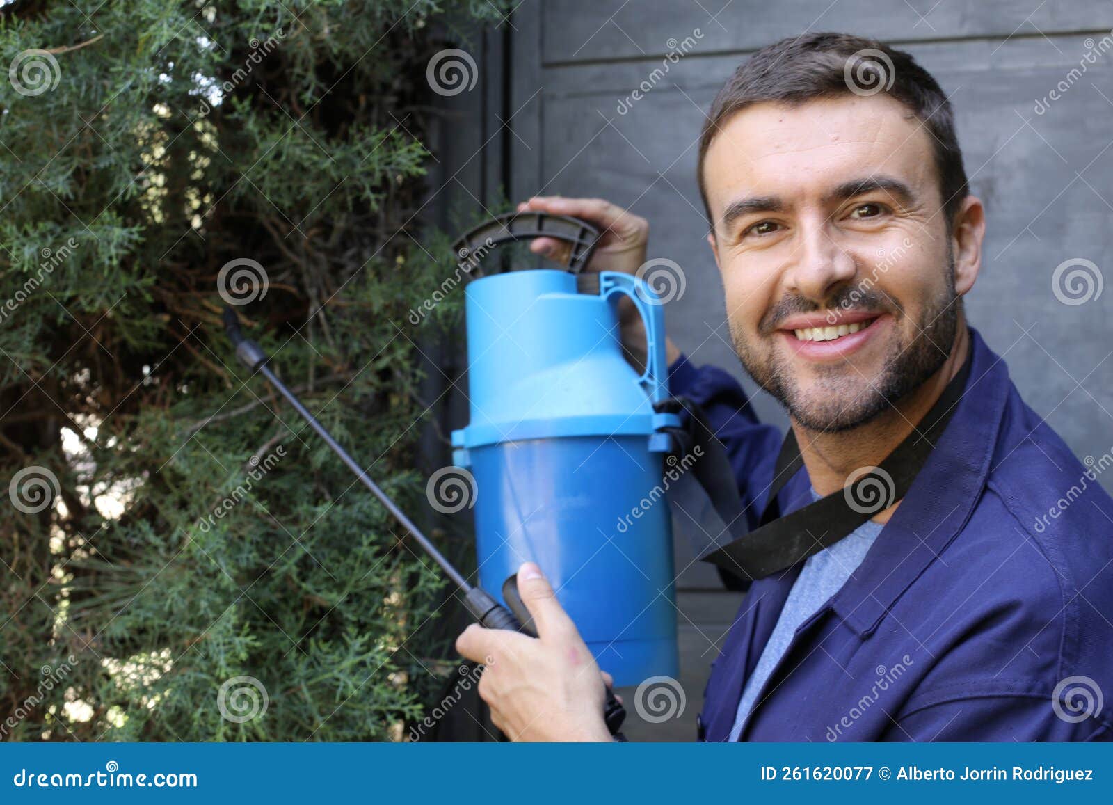 Gardener in Blue Uniform Holding Fumigation Equipment Stock Image ...