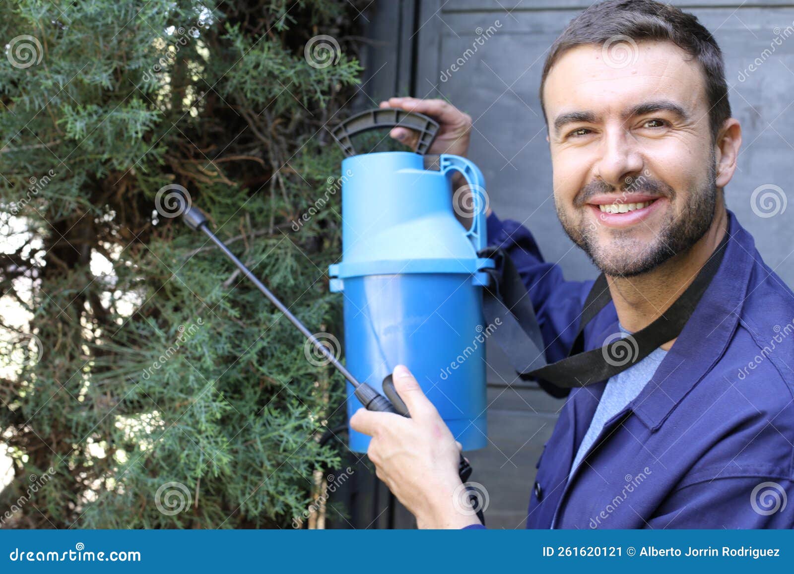 Gardener in Blue Uniform Holding Fumigation Equipment Stock Image ...