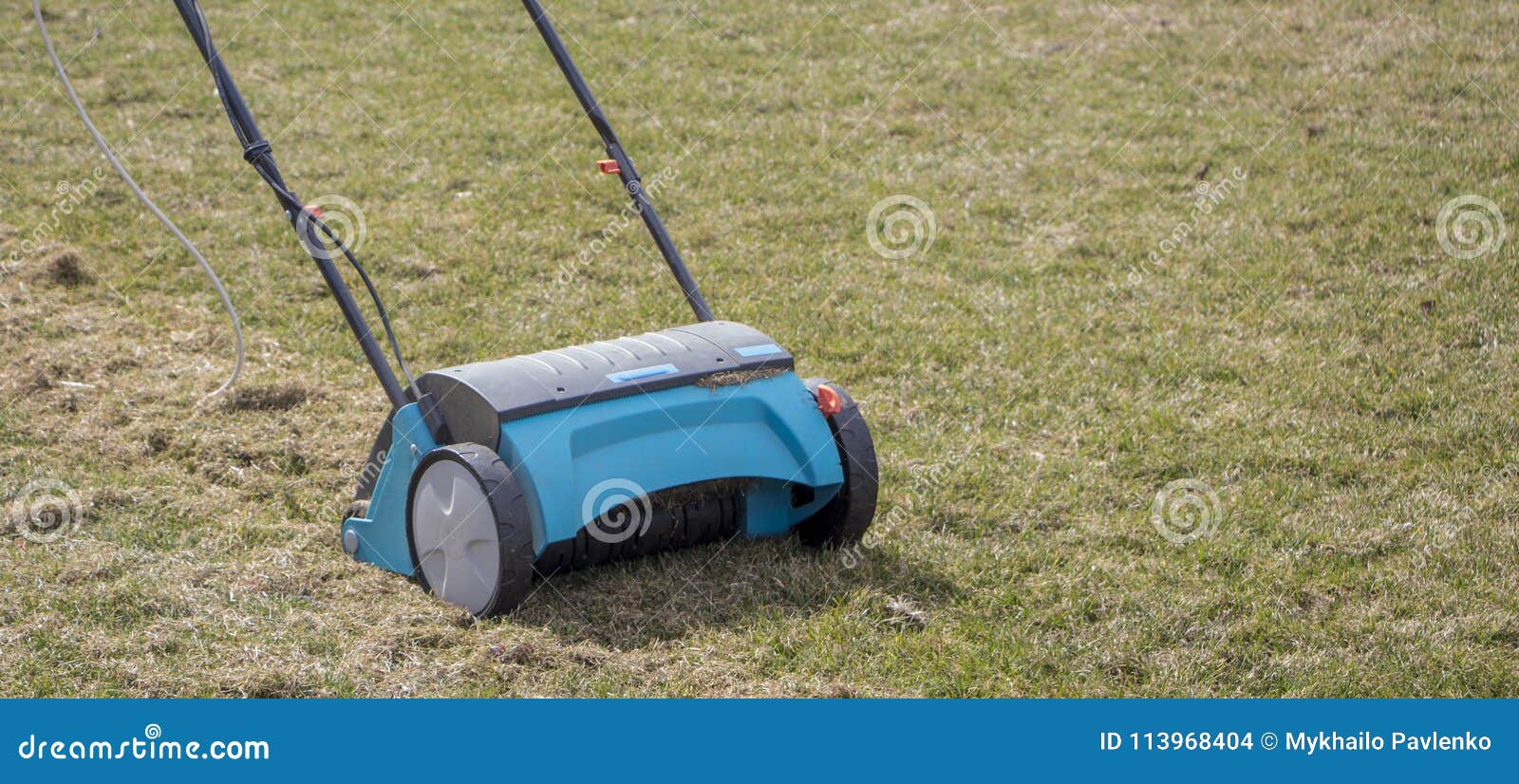 Gardener Operating Soil Aeration Machine on Grass Lawn Stock Photo ...
