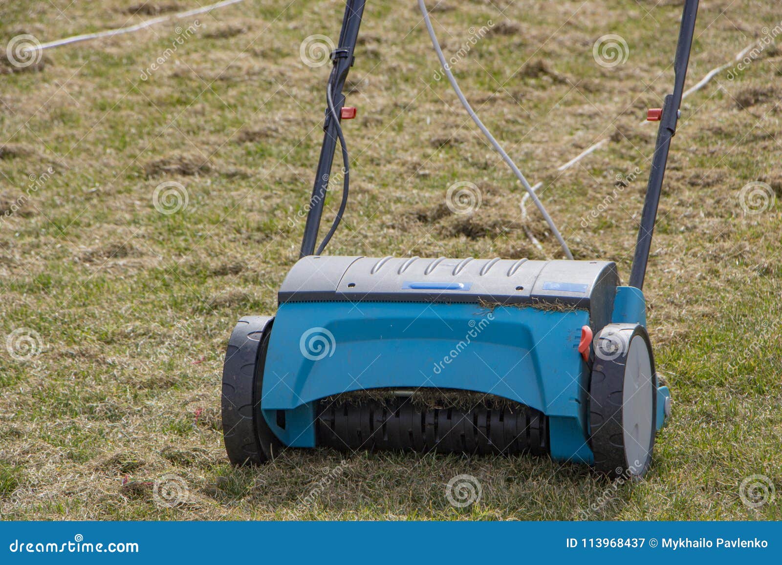 Gardener Operating Soil Aeration Machine on Grass Lawn Stock Image ...