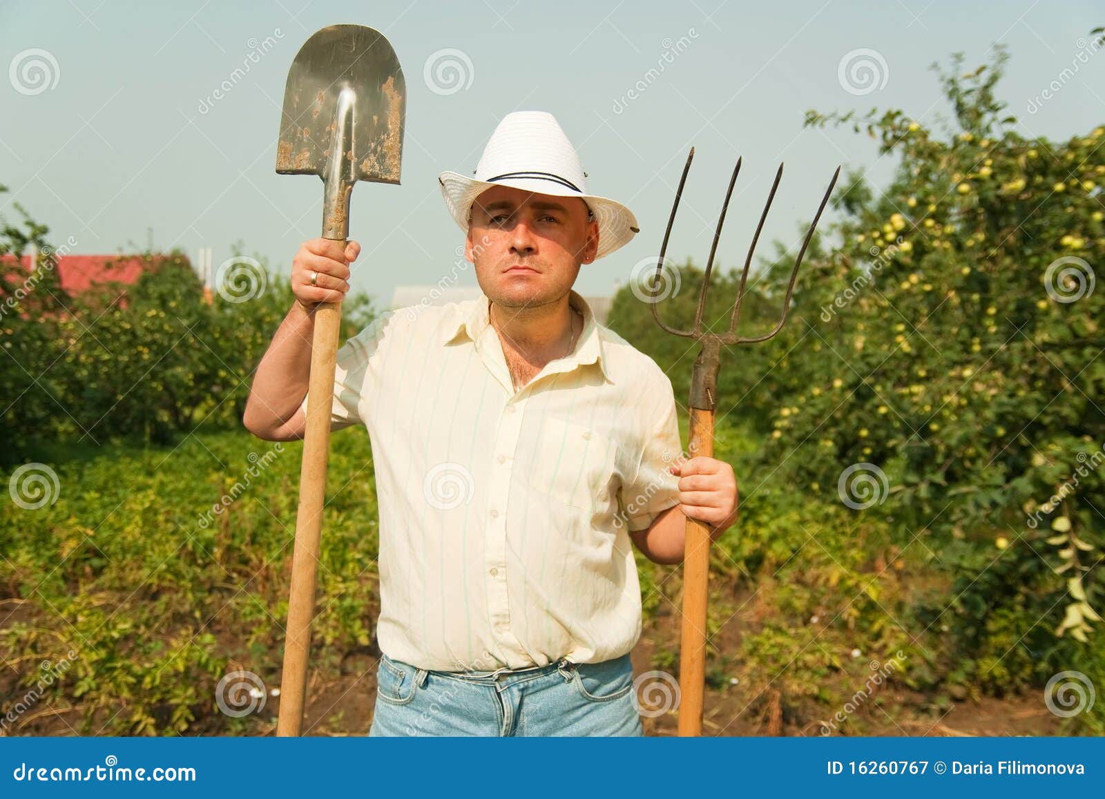 Gardener Posing with His Fork and Shovel Stock Image - Image of urban ...