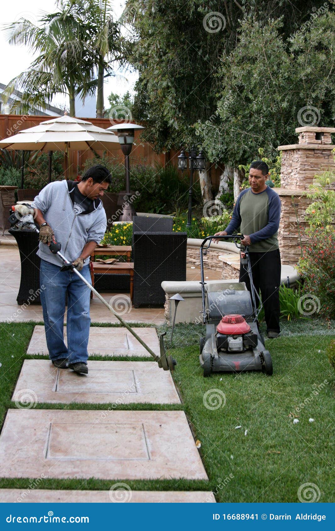 Gardeners Hard at Work stock image. Image of working - 16688941