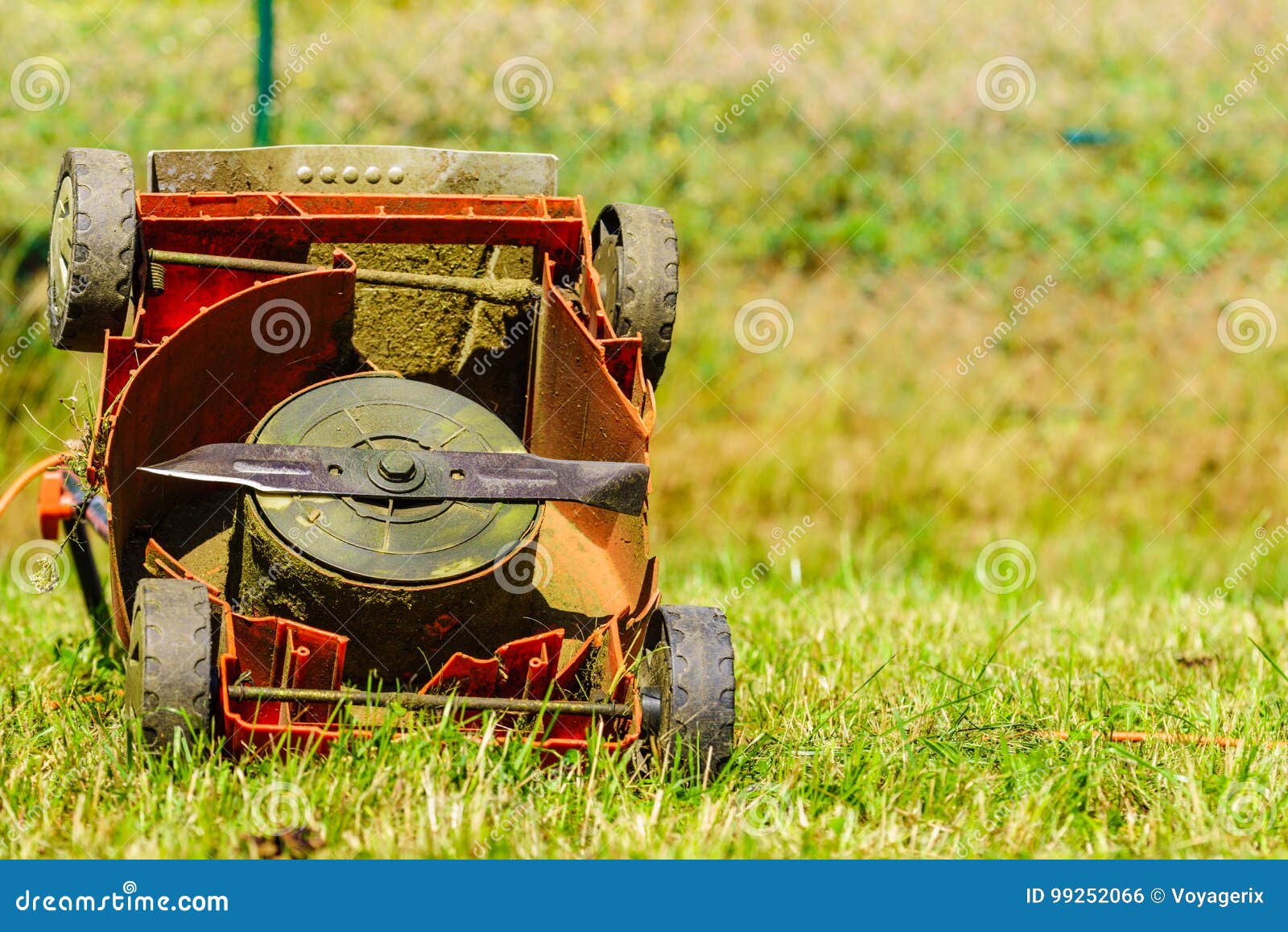 Broken Old Lawnmower in Backyard Grass Stock Photo - Image of green ...