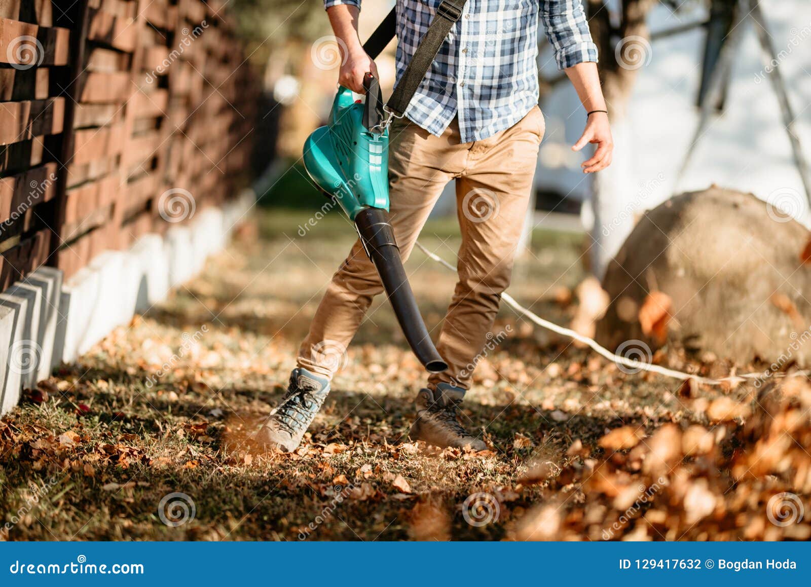 Gardening - Professional Landscaper Using Leaf Blower Stock Photo ...
