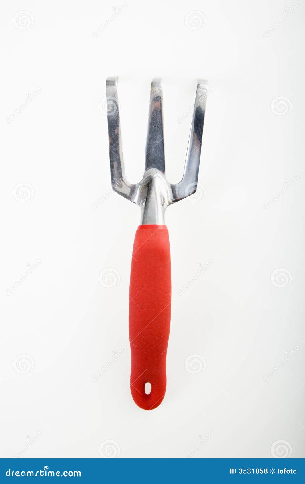 A Red Gardening Fork And Two Gardening Spades In Grass Stock ...
