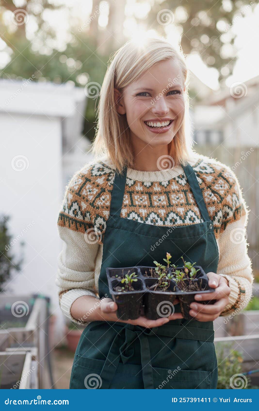 Gardening is Healthy Hobby. a Beautiful Young Woman Busy Gardening ... Gardening is Healthy Hobby. a Beautiful Young Woman Busy Gardening ...