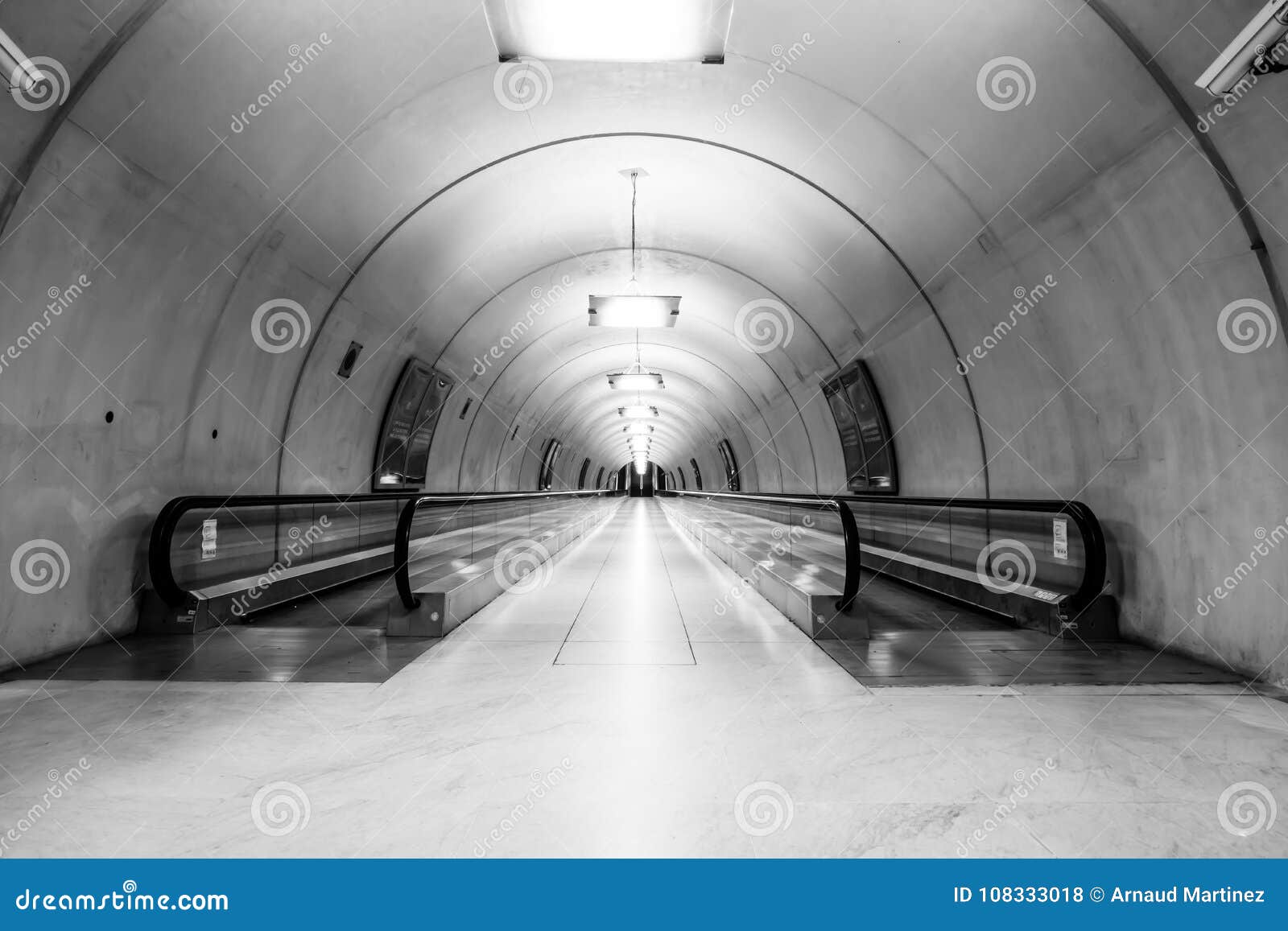 Illuminated Travelator And Directional Signs Stock Photography ...