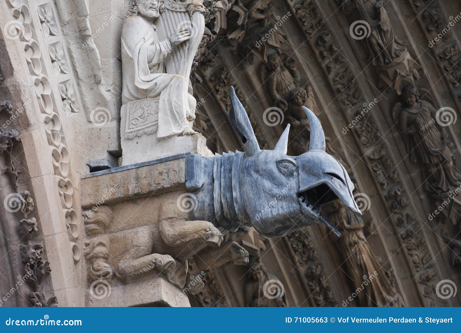Gargoyle with Streched Ears on a Side Wall of the Notre-Dame Cathedral ...