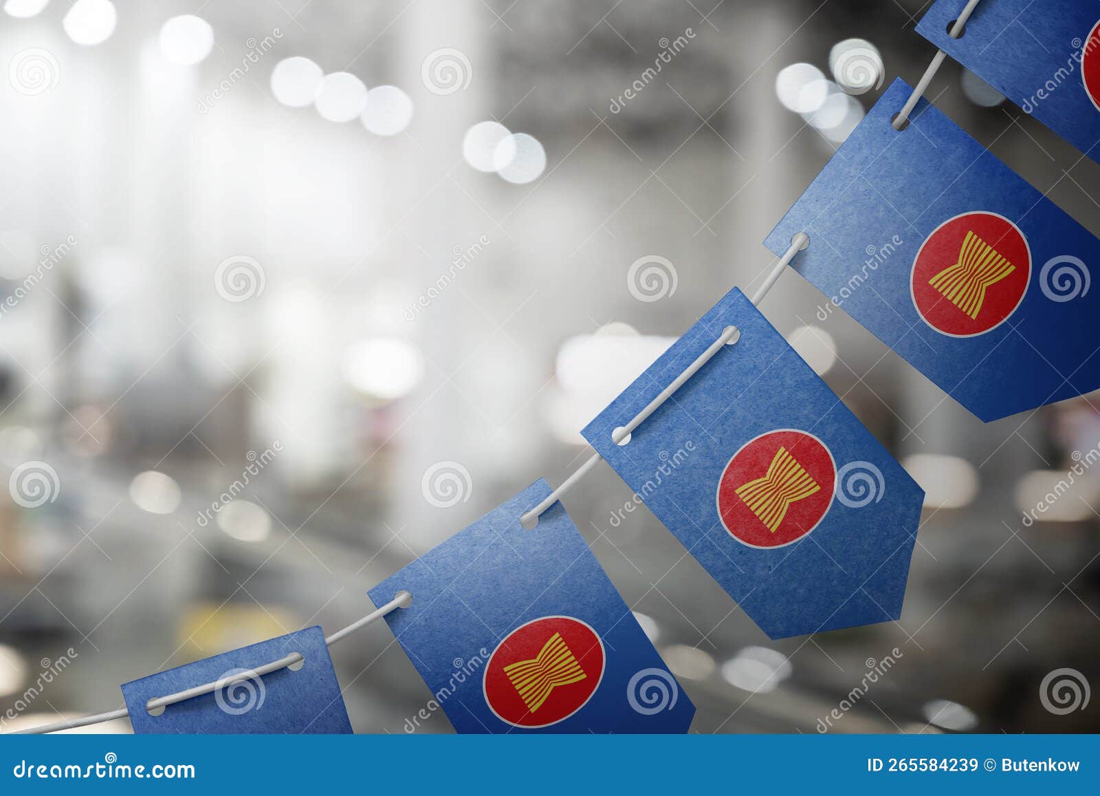 A Garland of ASEAN National Flags on an Abstract Blurred Background ...