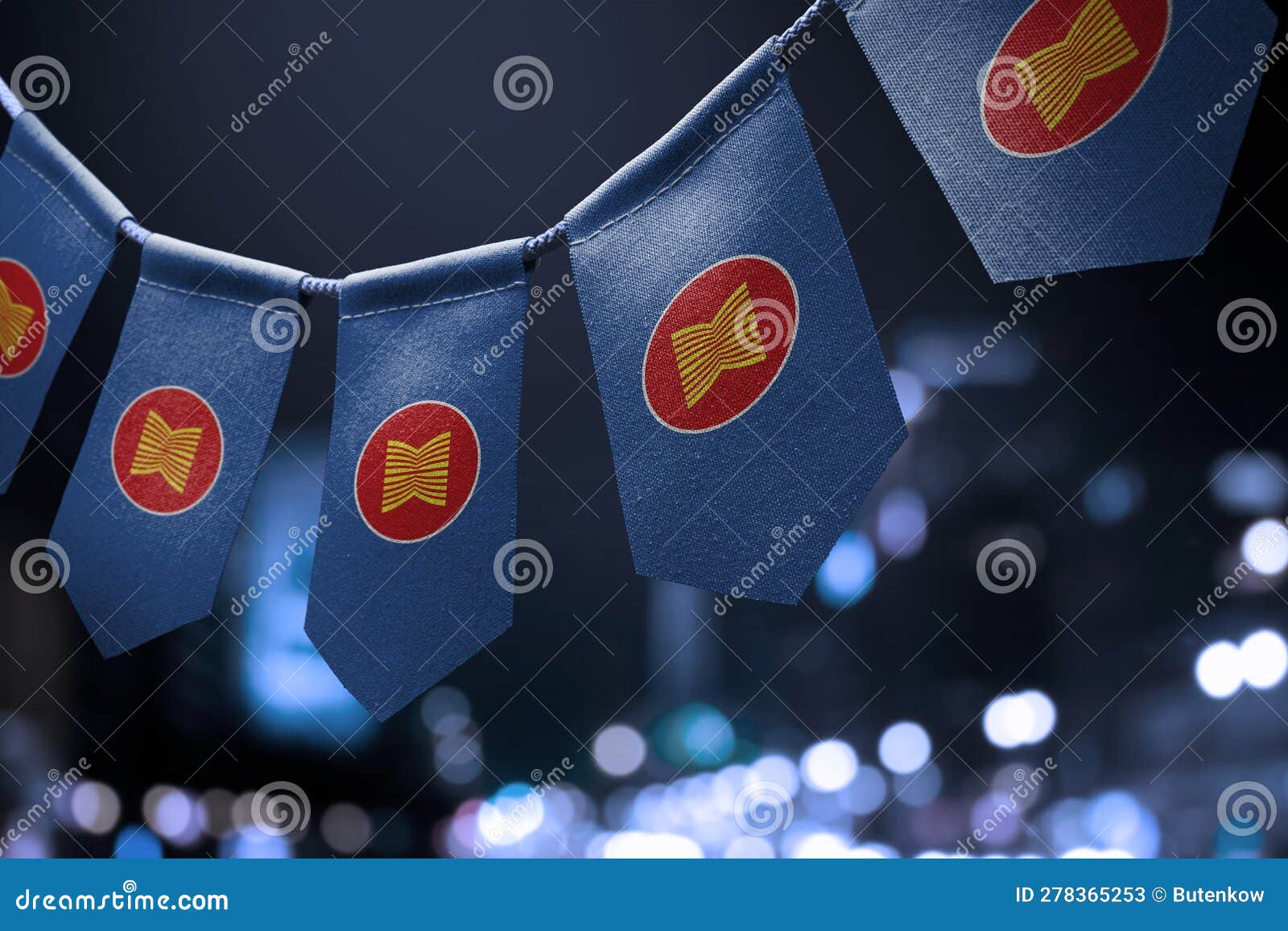 A Garland of ASEAN National Flags on an Abstract Blurred Background ...