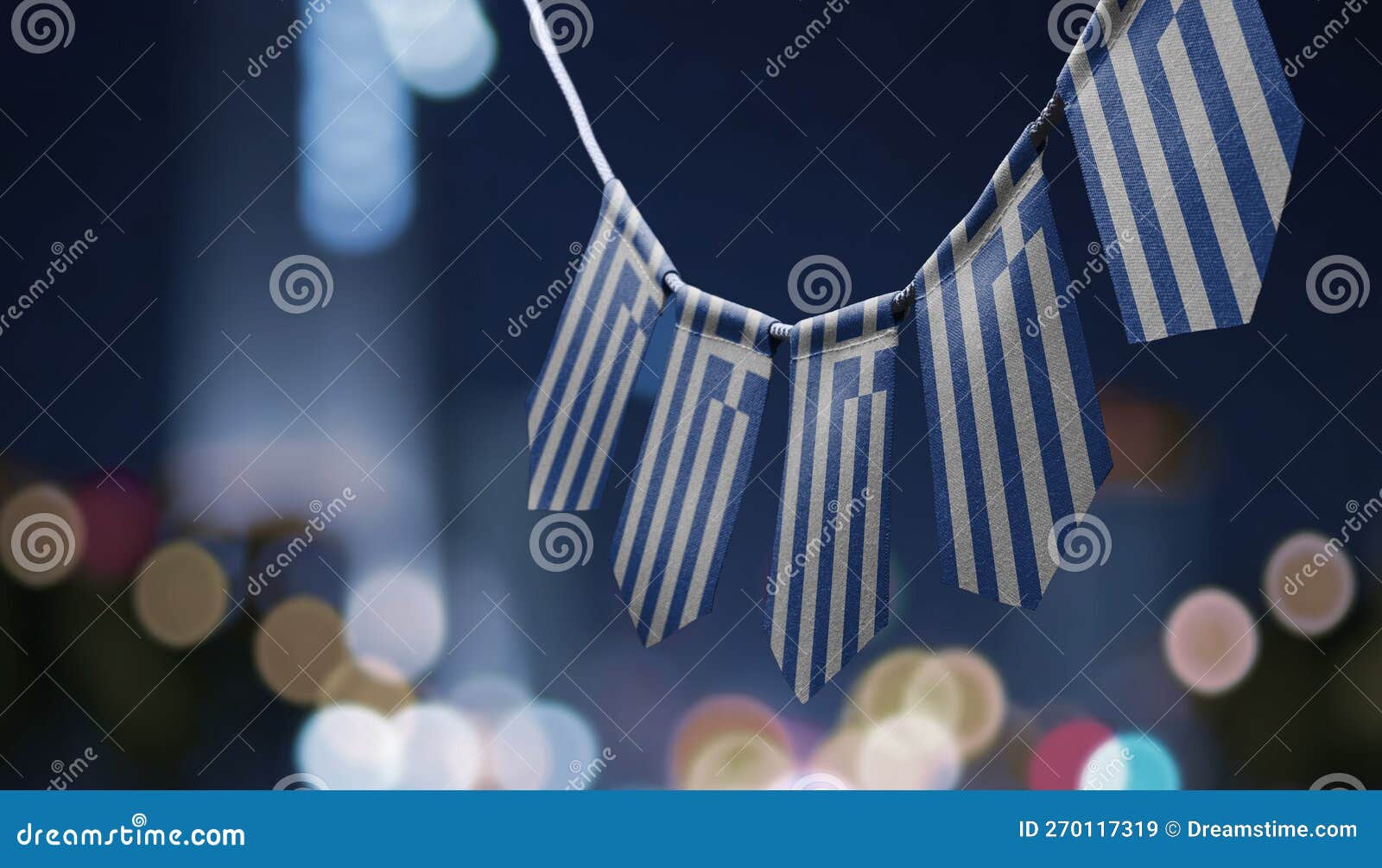 A Garland of Greece National Flags on an Abstract Blurred Background ...