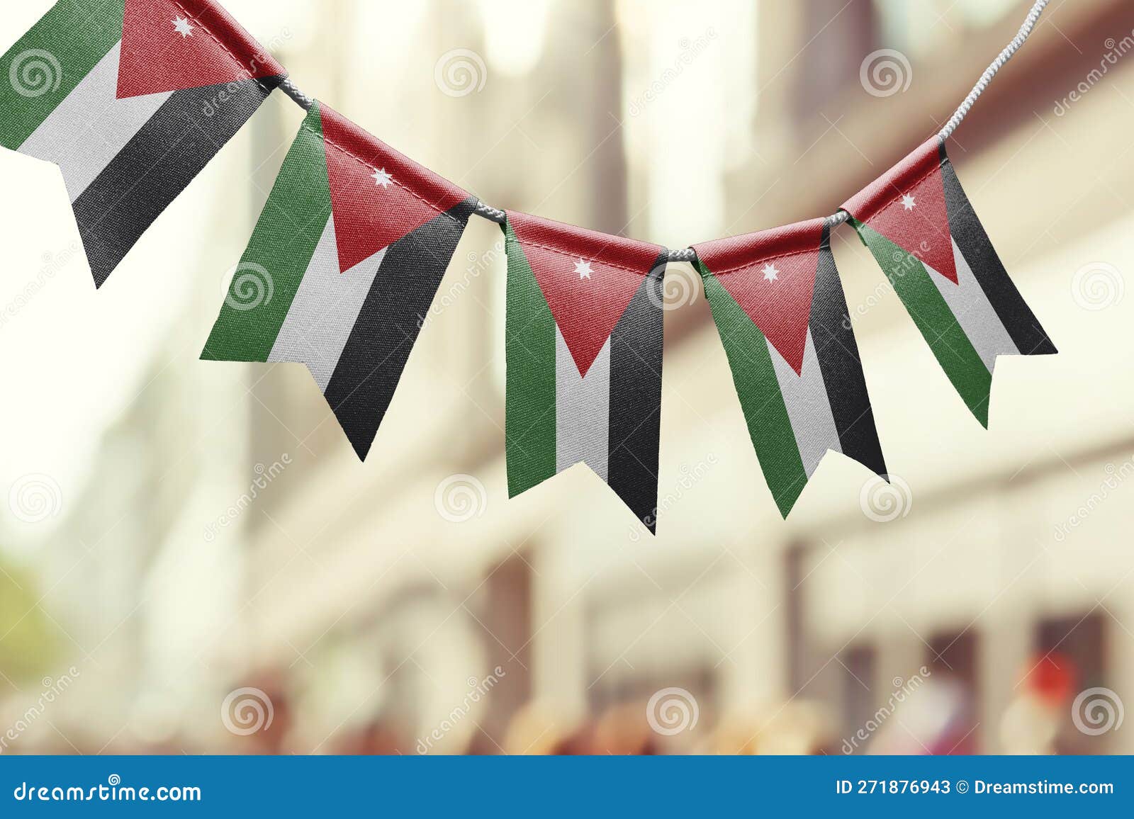 A Garland of Jordan National Flags on an Abstract Blurred Background ...