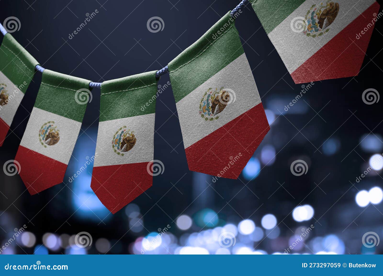 A Garland of Mexico National Flags on an Abstract Blurred Background ...