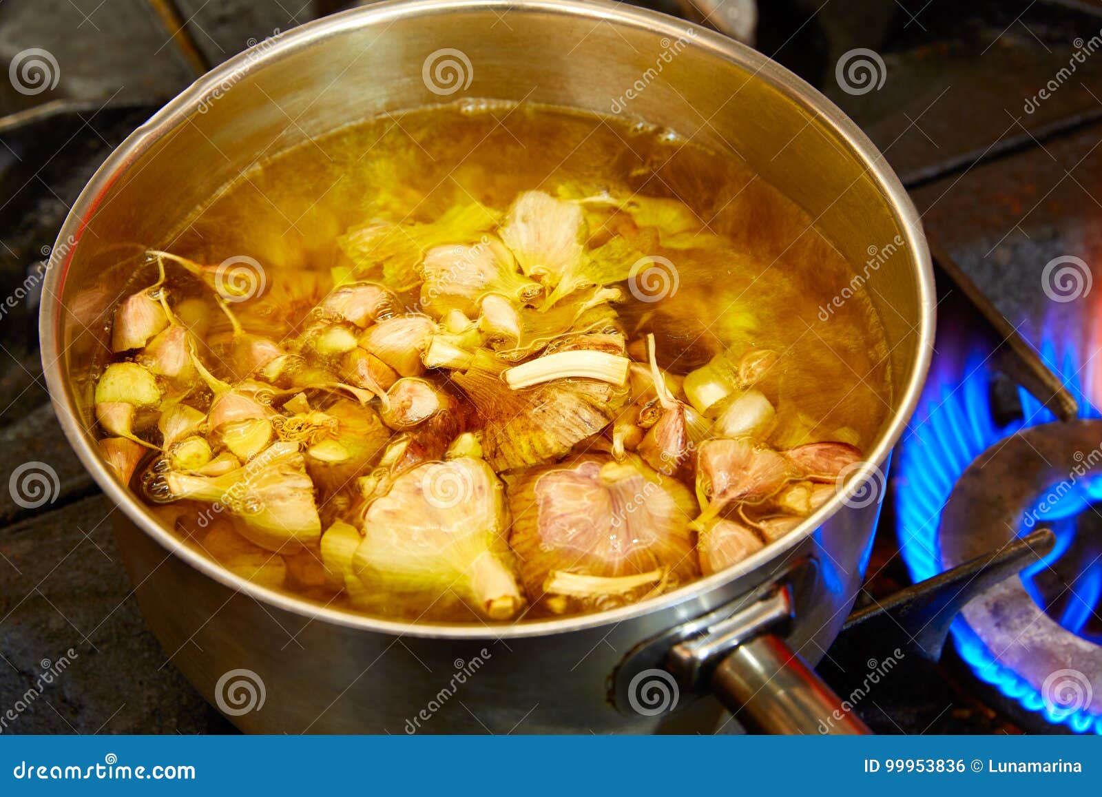 Garlic Boiling Soup in a Pan Stock Photo - Image of garlic, gourmet ...