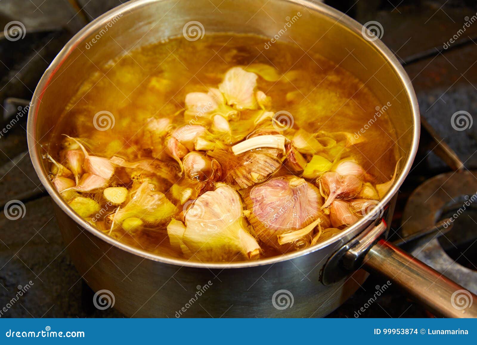 Garlic Boiling Soup in a Pan Stock Photo - Image of cuisine, garlic ...