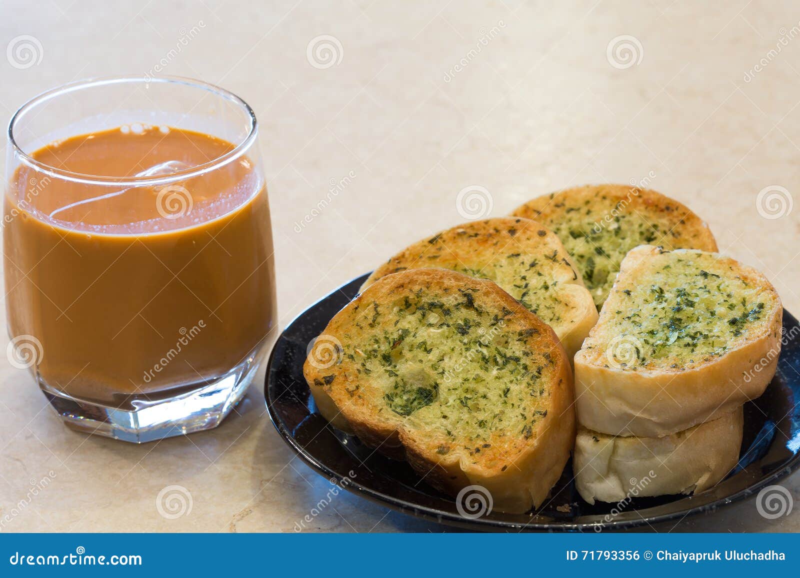 Garlic bread with tea stock photo. Image of italy, green - 71793356