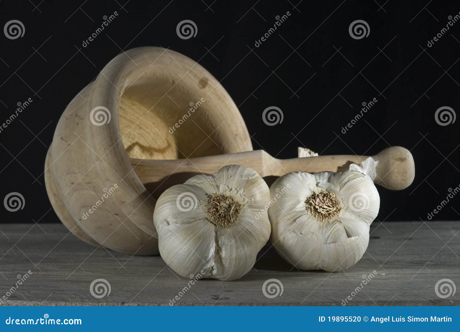 Garlic bulbs mortar pestle stock photo. Image of uncooked - 19895520