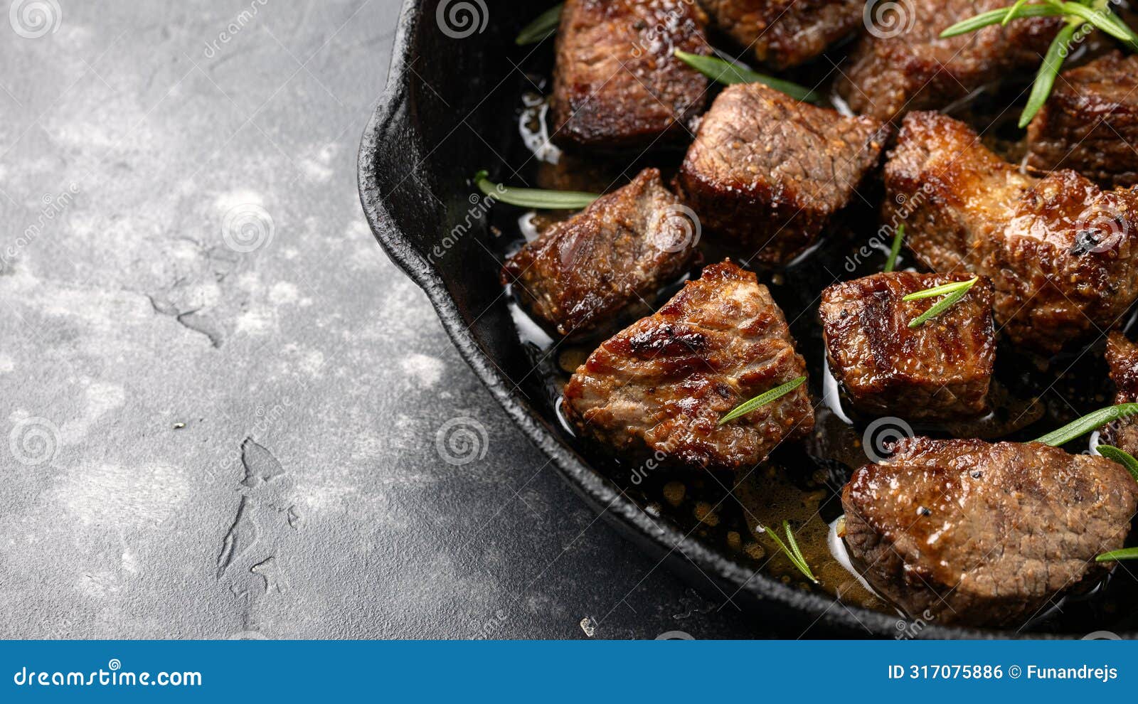 Garlic Butter Beef Steak Bites in Iron Cast Pan Stock Photo - Image of ...