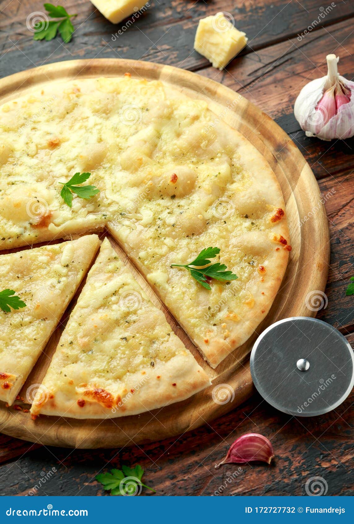Garlic Cheese Pizza on Wooden Board with Herbs. Stock Photo - Image of ...