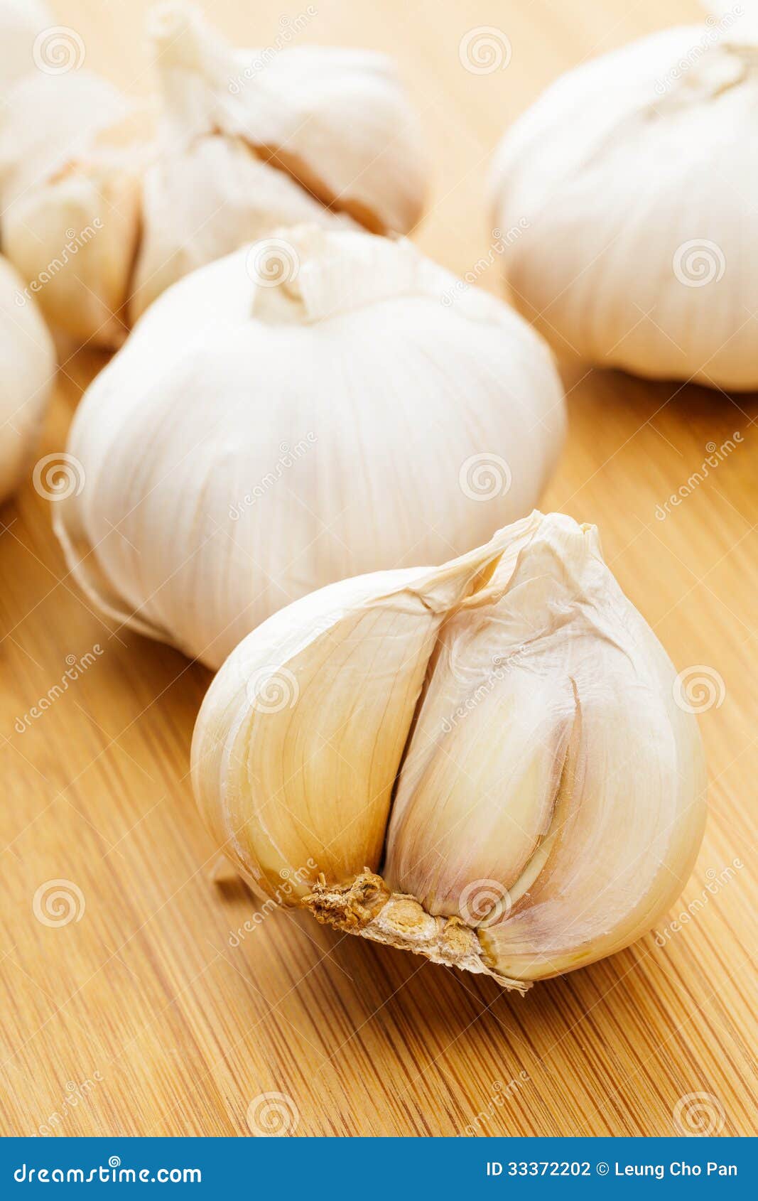 Garlic close up stock photo. Image of condiment, wooden - 33372202