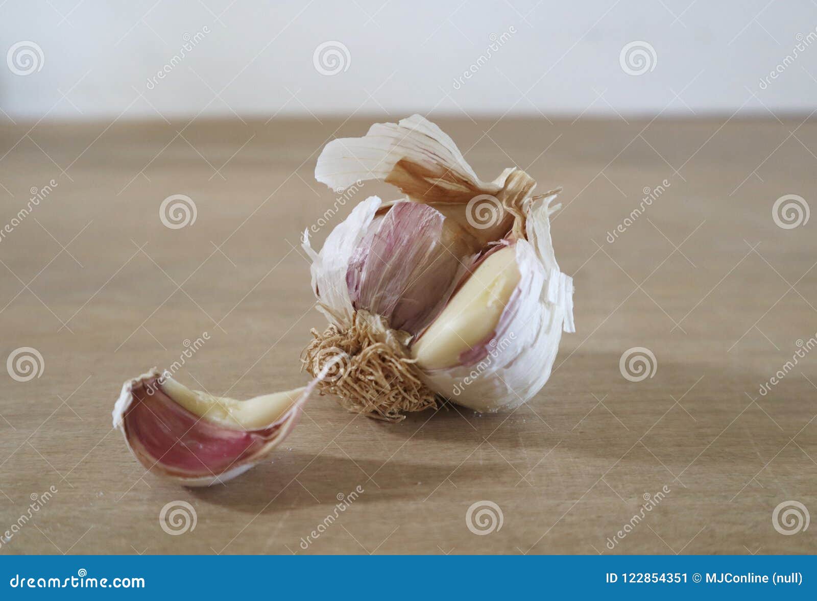Garlic Clove on Kitchen Table Stock Image - Image of recipe, herbs ...