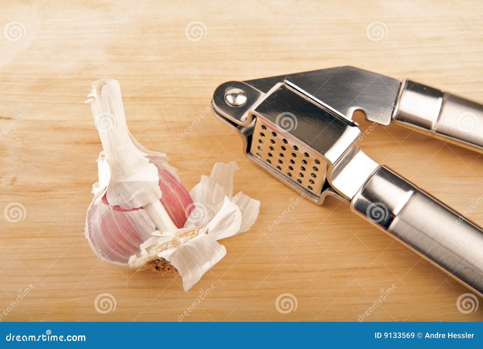 Garlic and garlic press stock image. Image of cooking - 9133569
