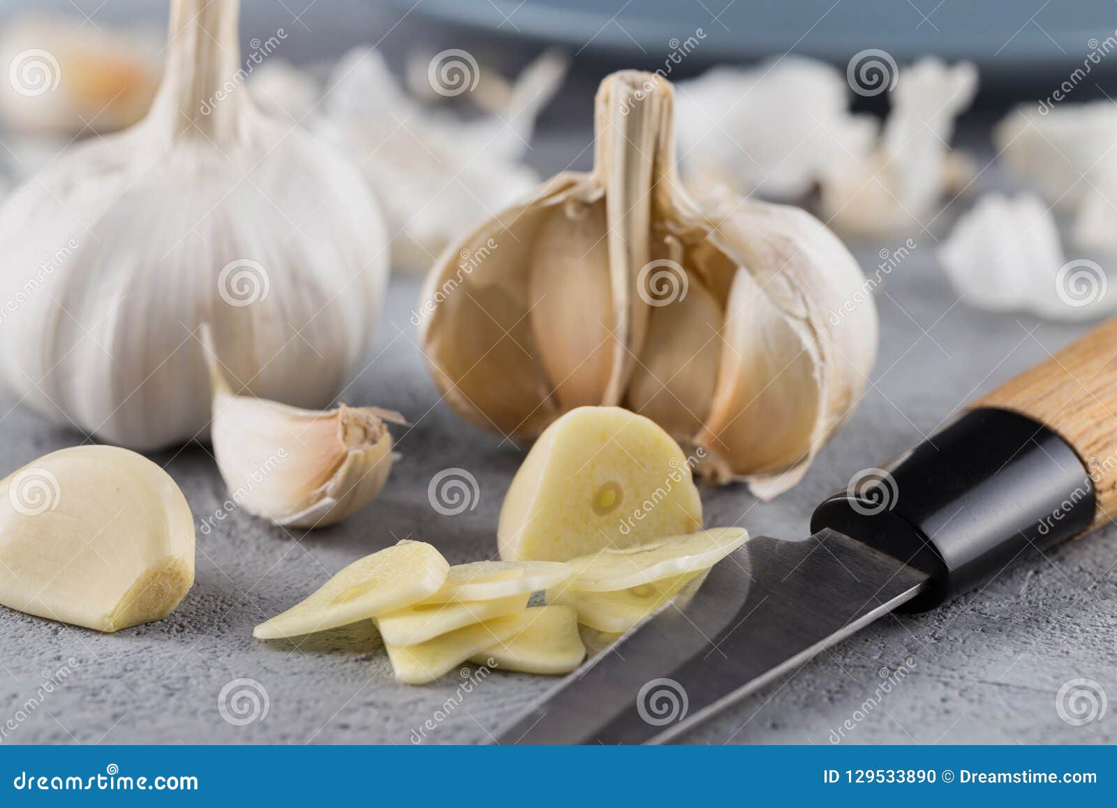 Garlic Heads Close-up on Grey Background. Condiment. Stock Photo ...