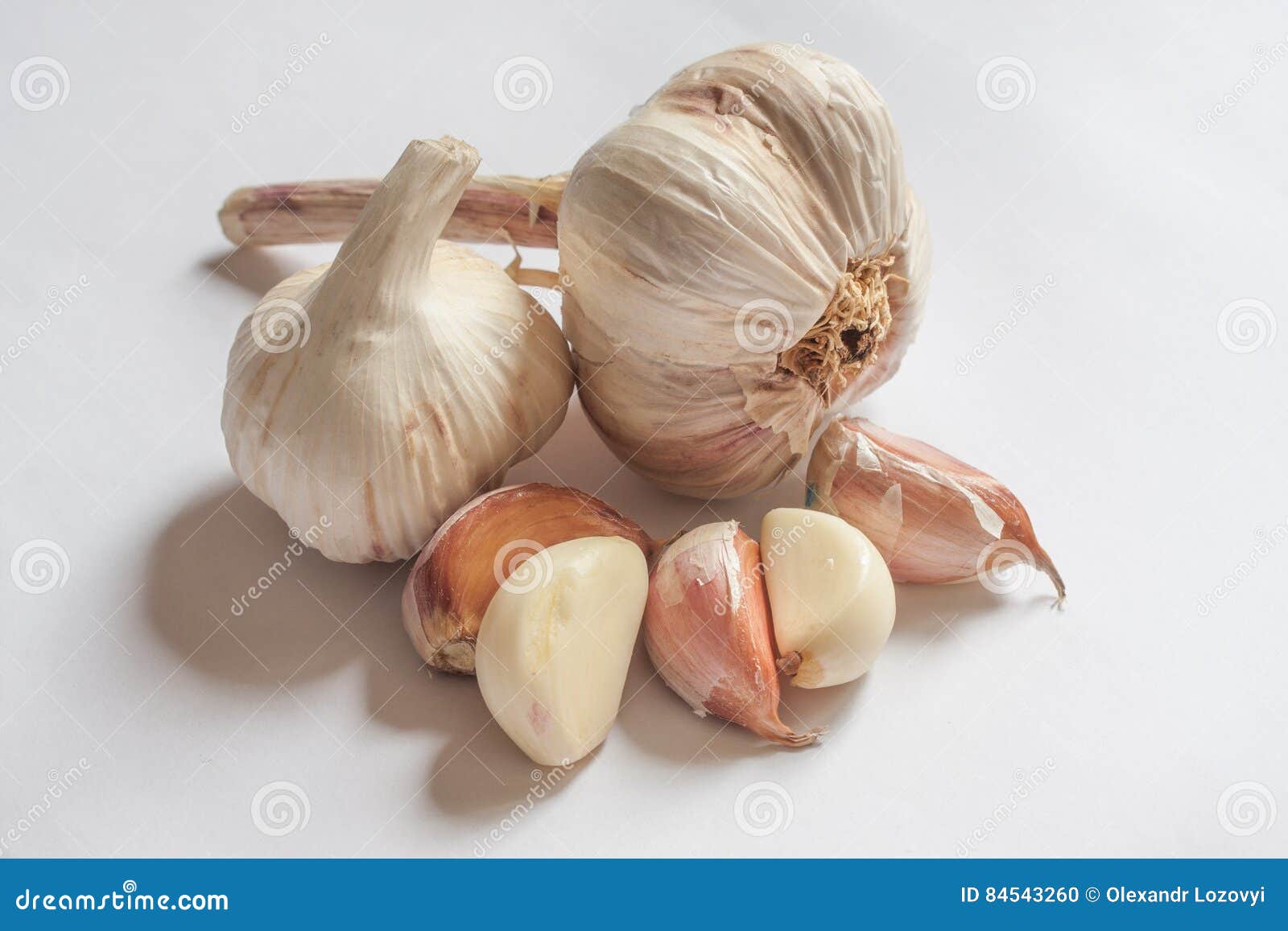 Garlic Pieces on the White Backgrounds Stock Photo - Image of cooking ...