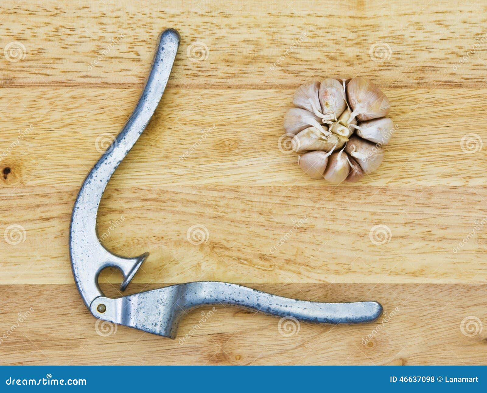 Garlic-press and Bulb on Wooden Board Stock Photo - Image of herb ...