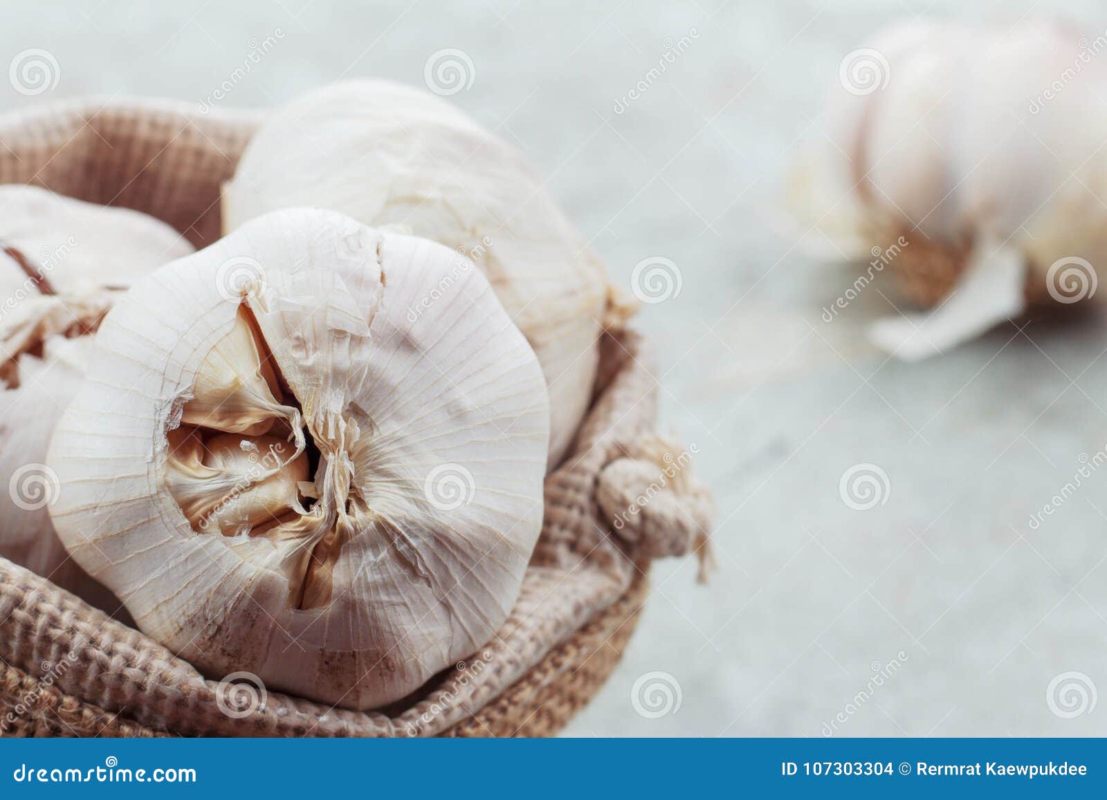 Garlic in a sack. stock photo. Image of condiment, macro - 107303304
