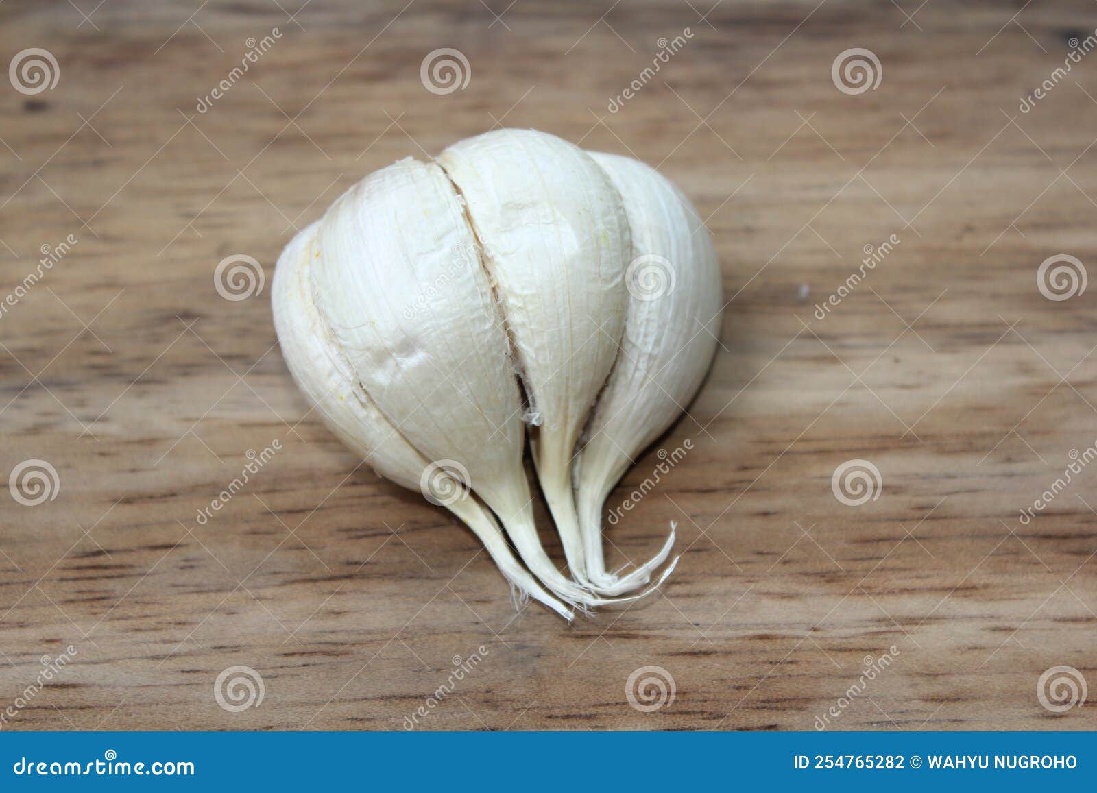 Garlic and wood texture stock photo. Image of petal - 254765282