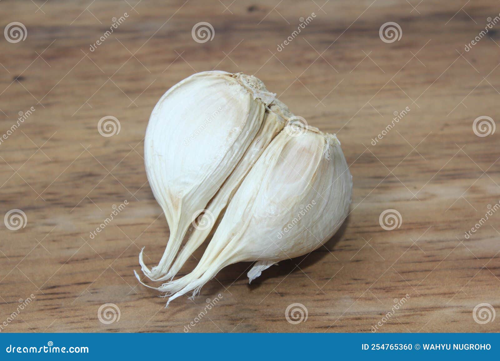 Garlic and wood texture stock photo. Image of produce - 254765360