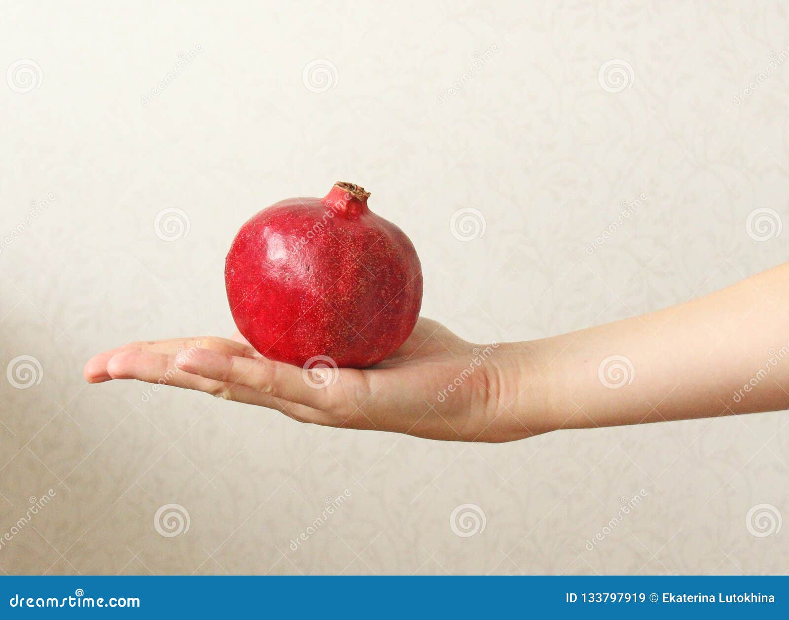 Garnet. the Fruit of the Grenade Lies on the Hand Stock Image - Image ...