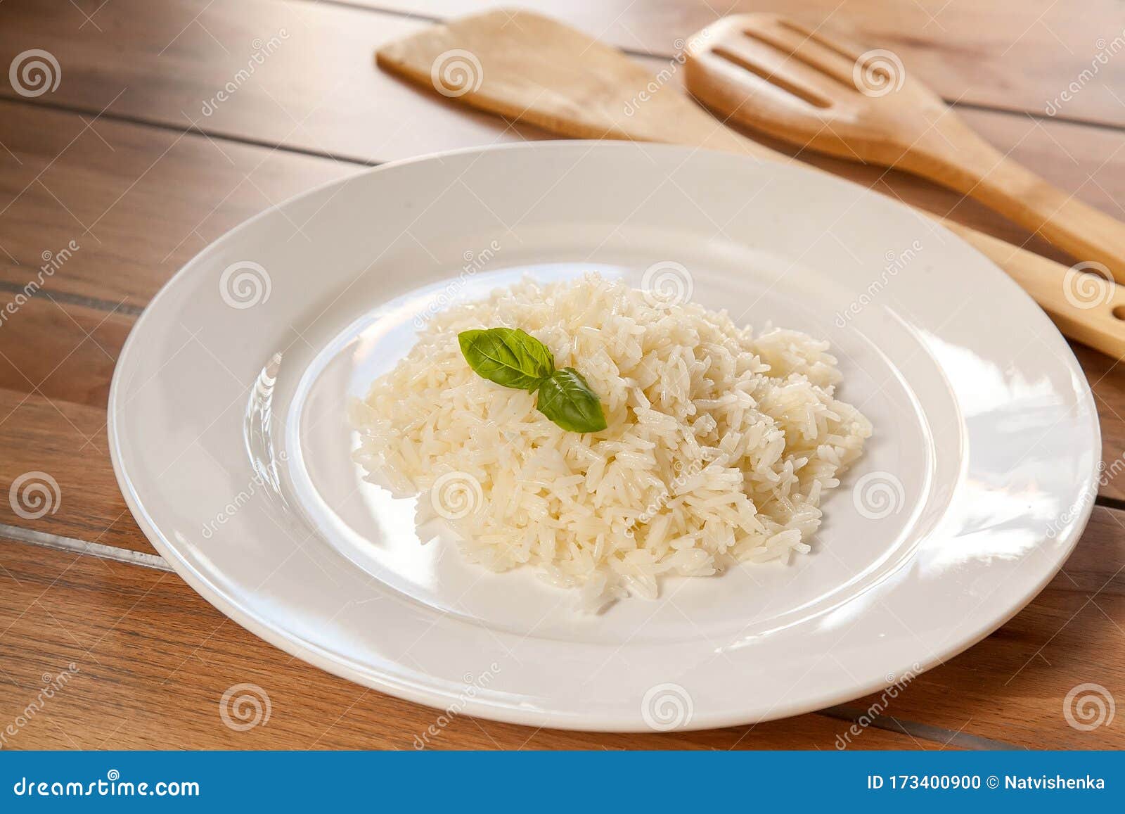 Garnish Rice Boiled with Basil on the Plate. European Cuisine Stock ...