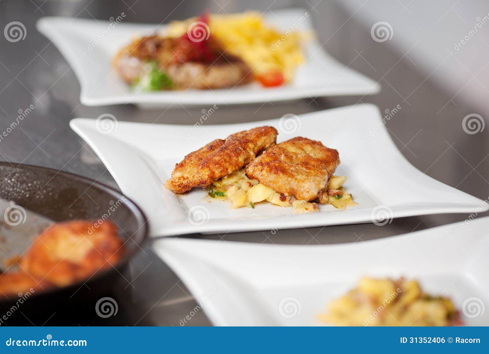 Garnished Dishes on Restaurant Kitchen Counter Stock Photo - Image of ...