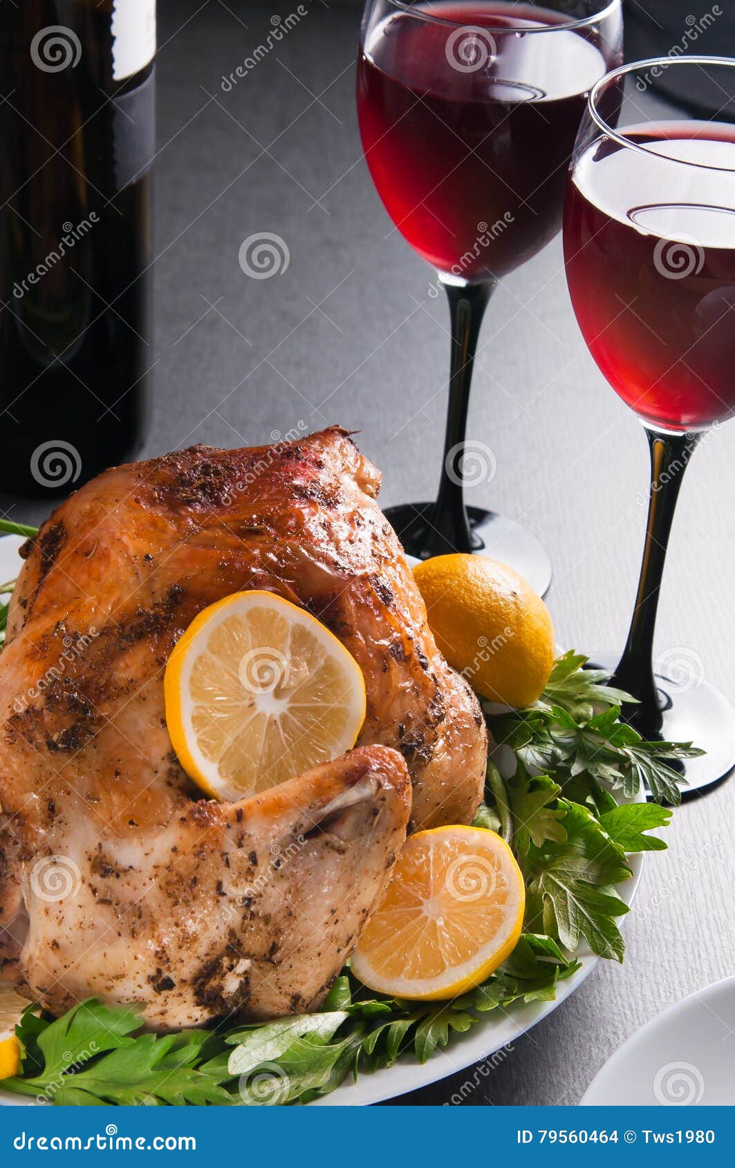 Garnished Roasted Turkey on Holiday Decorated Table with Glasses of Red ...