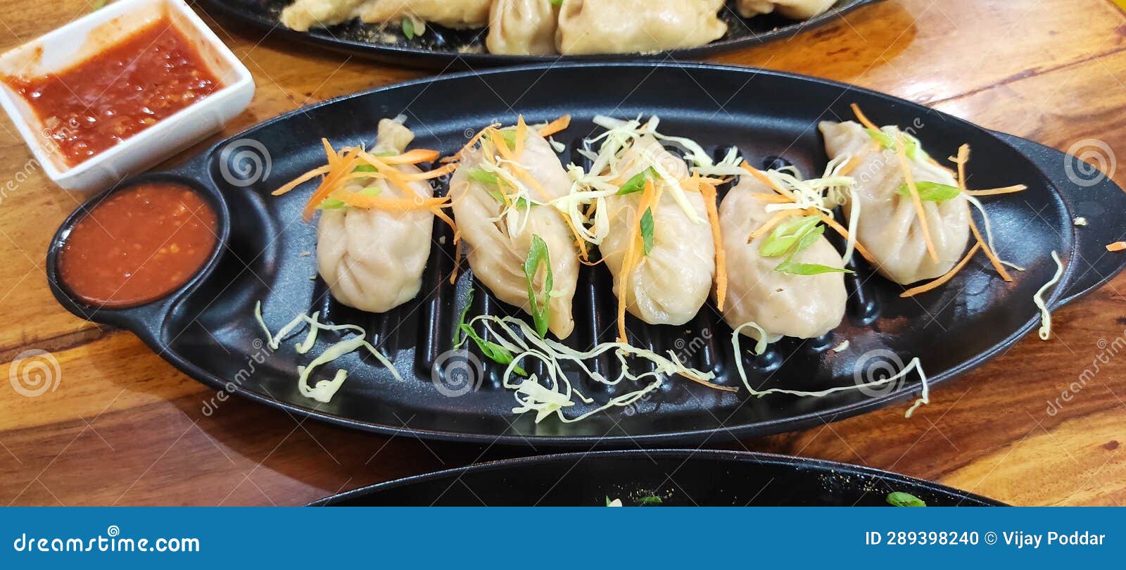 Garnished Steam Paneer Momos in Cafe Stock Photo - Image of paneer ...