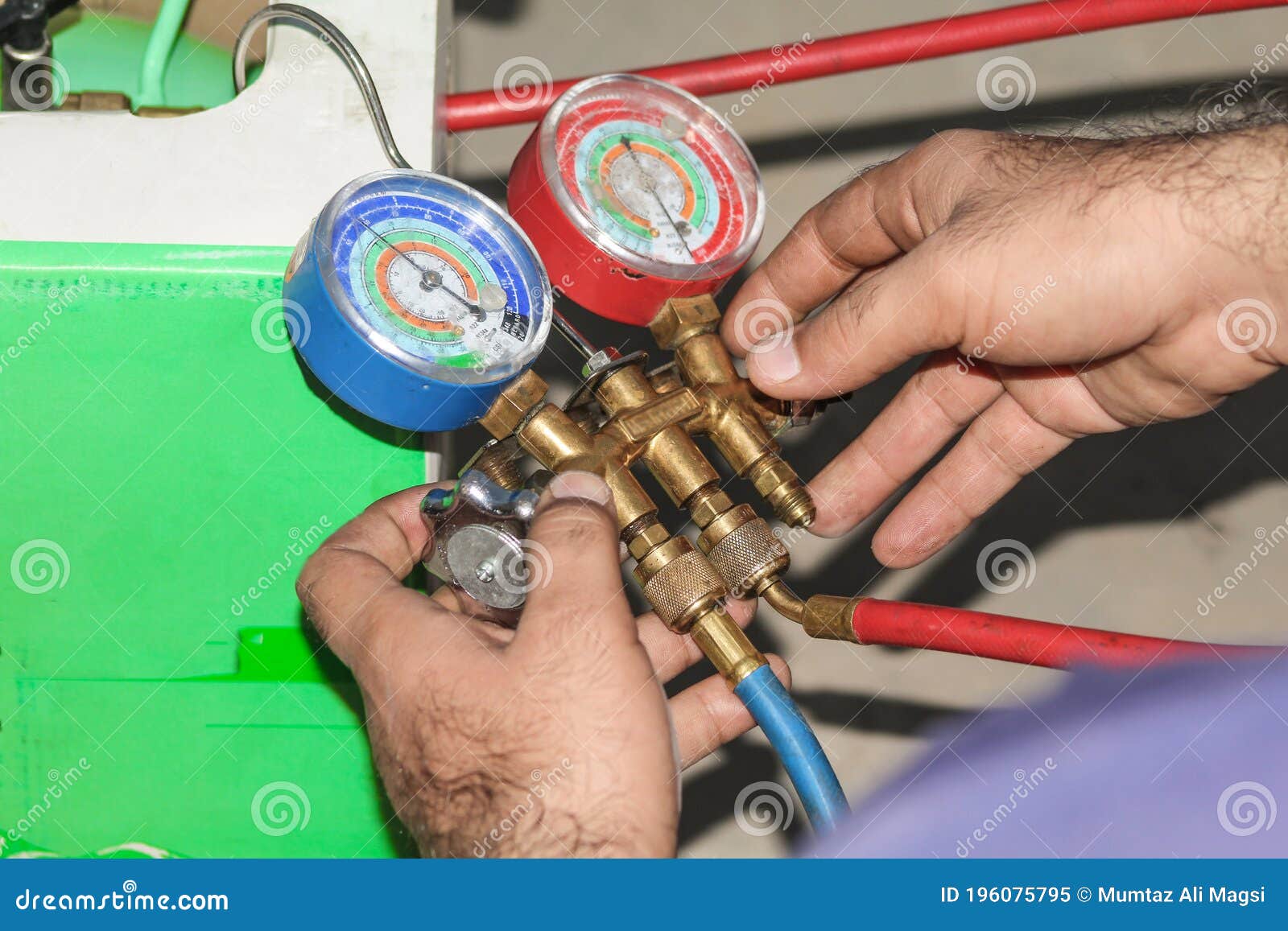 Gas is Being Refiling into the Heavy Ac Compressor of Central Air ...