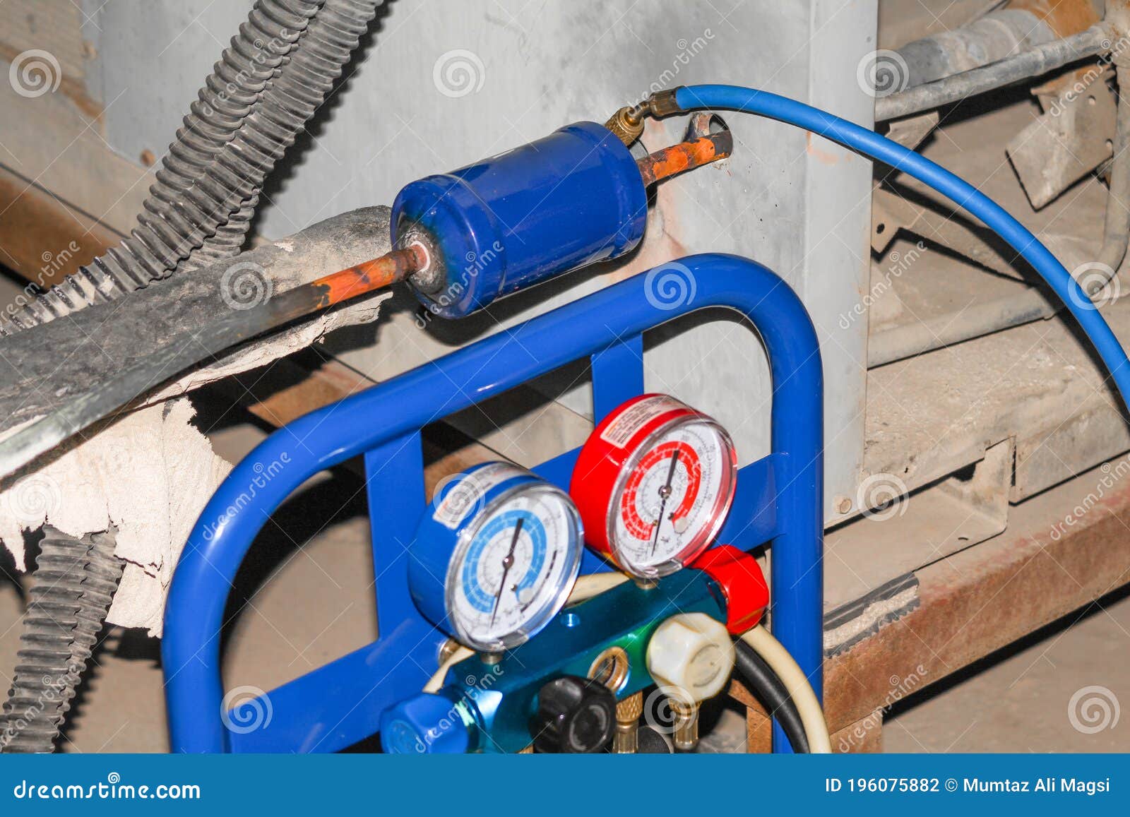 Gas is Being Refiling into the Heavy Ac Compressor of Central Air ...